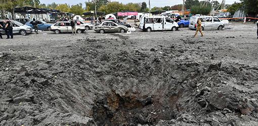 Civilians killed in Ukraine convoy attack as Putin to proclaim rule ...